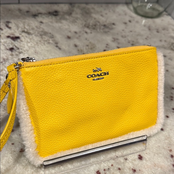 Coach | Bags | Coach Shearling And Pebbled Yellow Leather Wristlet ...
